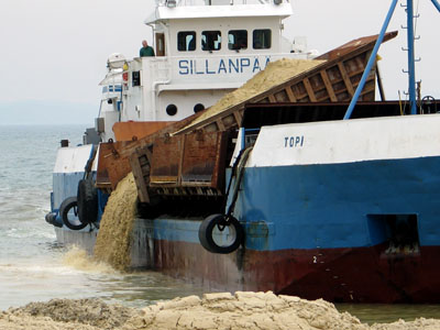 Photographs by Peter Wiles: French sand drop